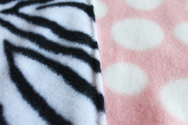 How to Make Fleece Blankets from Scraps - Cutesy Crafts