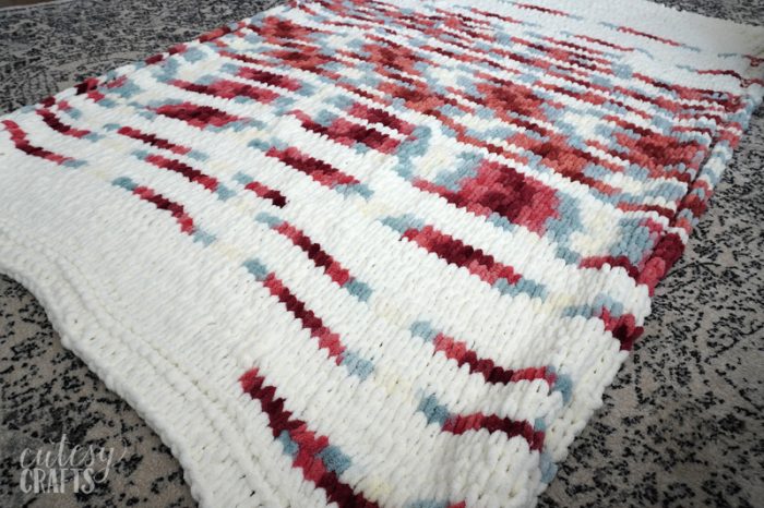 How to Make a Loop Yarn Blanket - Cutesy Crafts