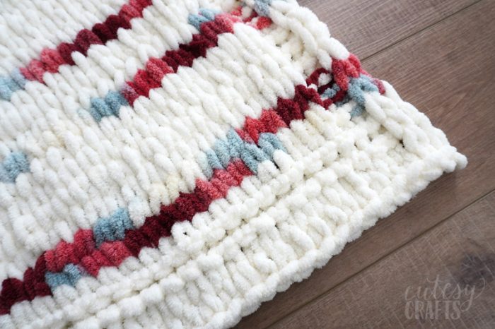 How to Make a Loop Yarn Blanket - Cutesy Crafts