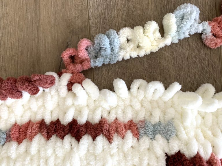 How to Make a Loop Yarn Blanket - Cutesy Crafts